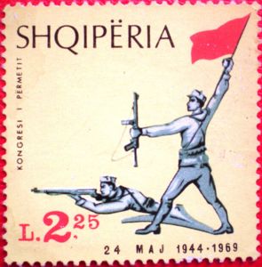 Stamp: Two Partisans with Guns and Flag (Albania(25th anniversary of ...
