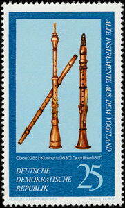 Stamp: Oboe (1785), clarinet (1830), flute (1817) (Germany, Democratic ...