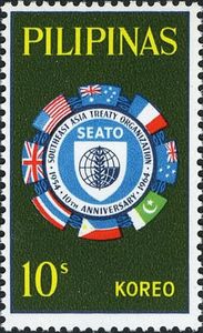 Stamp: Flags surrounding SEATO emblem (Philippines) (10th anniversary ...
