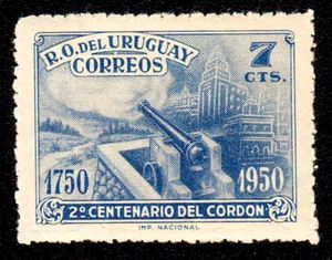 Stamp: Old fortress with firing cannon, right modern Montevideo ...