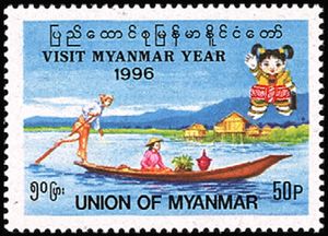 Stamp: Couple in Boat on Inlay Lake with Food Bowl for Buddha (Myanmar ...