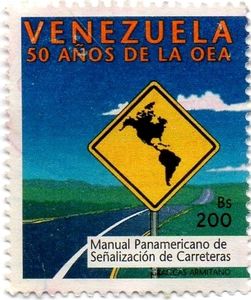 Stamp: Road Sign with Map of Americas (Venezuela(Organization of the ...