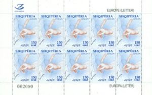Stamp: Hand holding quill pen, map of Albania and Adriatic region ...