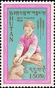 Stamp: Boy filling grain box (Bhutan(FAO “Freedom from Hunger” campaign ...