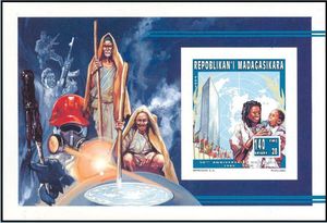 Stamp: UN50 Woman feeding child (Madagascar(UN (United Nations), 50th ...