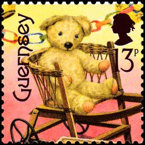 Stamp: Small Teddy Bear in Bassinette (Guernsey(Christmas 1994: Bygone ...