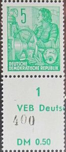 Stamp: Woman Turning Wheel (Germany, Democratic Republic (DDR)(Five ...