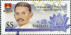 Stamp: Mahatma Gandhi - Quote, Arms and Flower (Kiribati(150th Birth ...