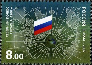 Stamp: Mirrored map of the Arctic, Russian flag on the North Pole ...