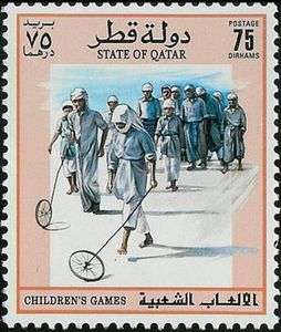 Stamp: Wheel running (Qatar(Children's Games) Mi:QA 1023,Sn:QA 834,Yt ...