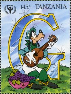 Stamp: The letter "G" - Goofy playing Guitar (Tanzania(Disney - Int ...