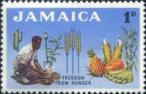Stamp: Man planting mango tree and produce (Jamaica(Freedom from Hunger ...