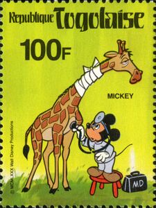 Briefmarke: Doctor Mickey Mouse examining a giraffe with a sore throat ...