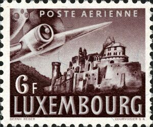 Stamp: Airmail Engine over Vianden Castle (purple and blue) (Luxembourg ...