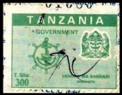 Stamp: Anchor, ship's wheel and coat of arms of Tanganyika (Tanzania ...