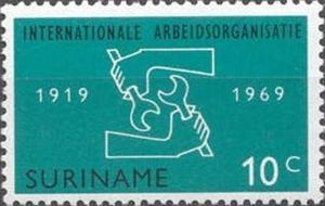 Stamp: ILO Emblem (Suriname(ILO, 50th anniversary) Mi:SR 562,Sn:SR 366 ...